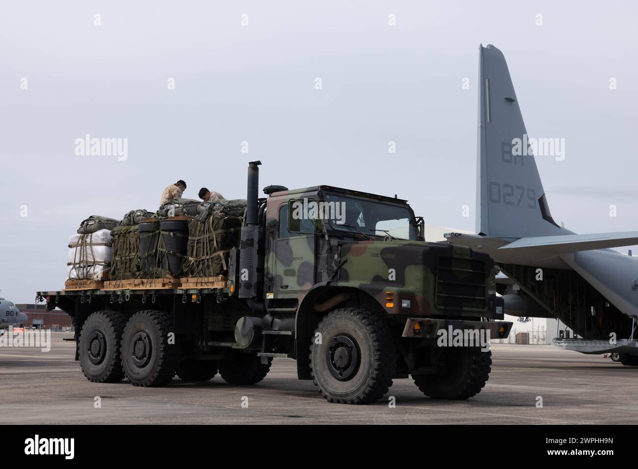 U.S. Marine Corps parachute riggers assigned to 2nd Distribution Supply ...