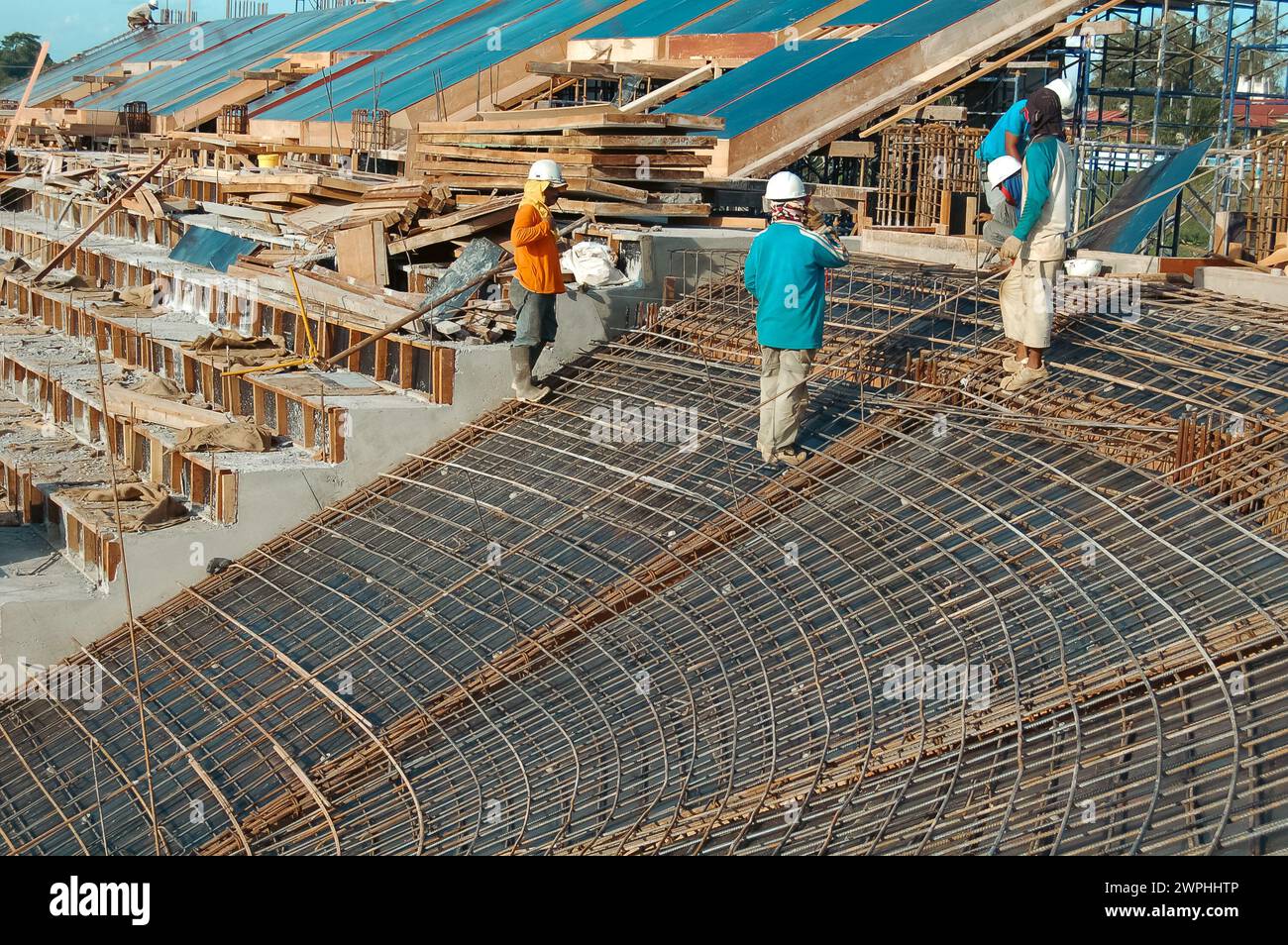Silhouette team construction workers hi-res stock photography and ...