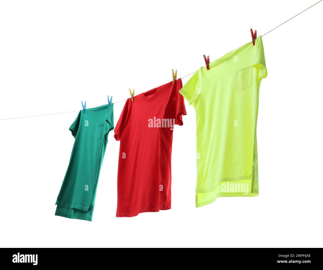 Colorful t-shirts drying on washing line isolated on white Stock Photo ...
