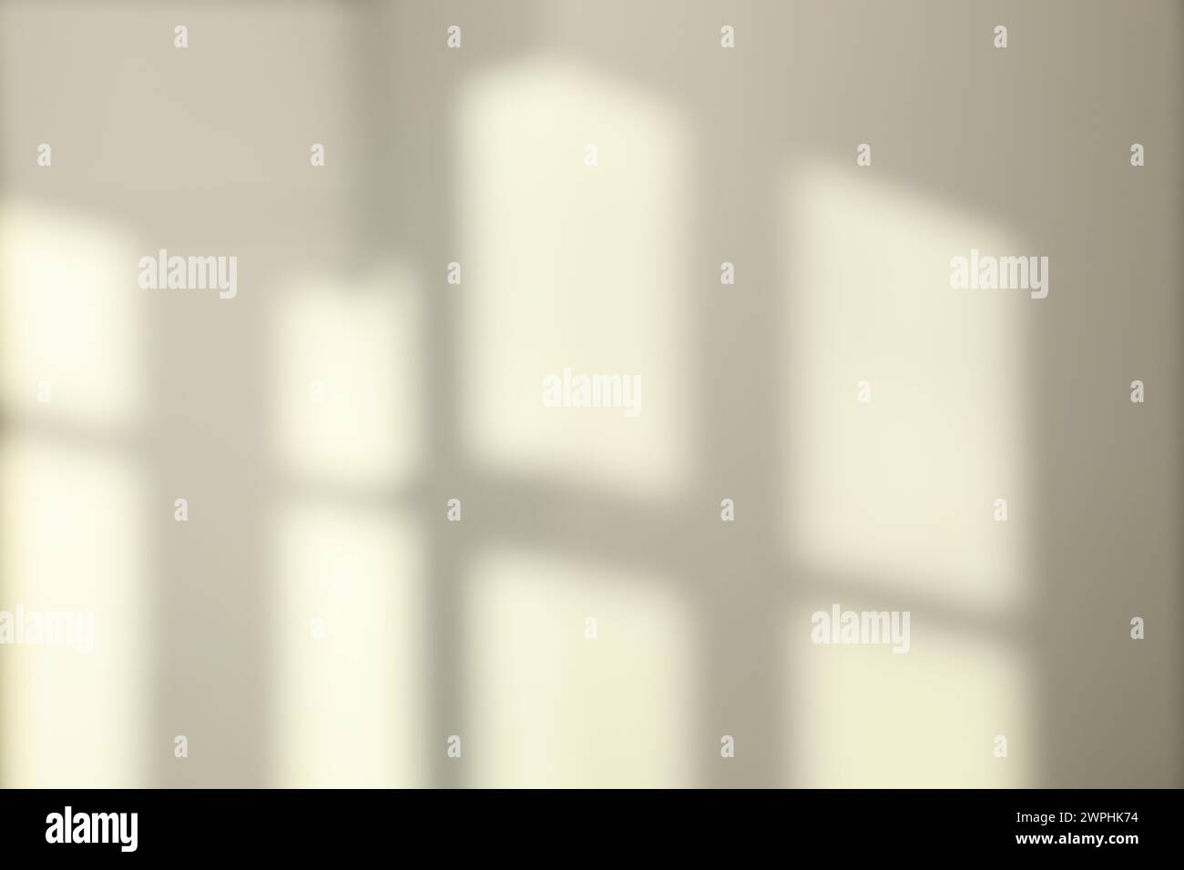 Light and shadows from window on wall indoors Stock Photo - Alamy