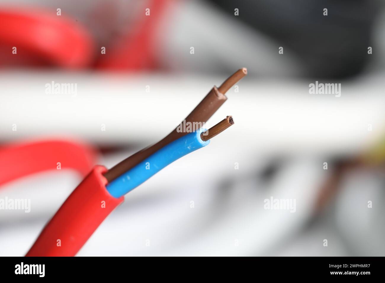 Colorful electrical wire on blurred background, closeup Stock Photo - Alamy