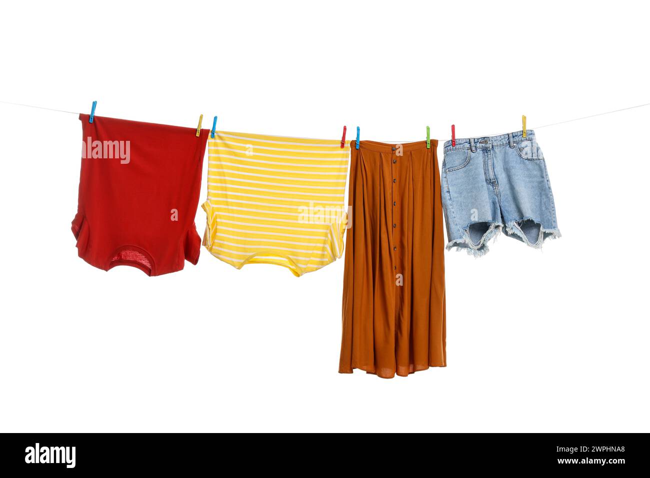 Different clothes drying on laundry line against white background Stock ...