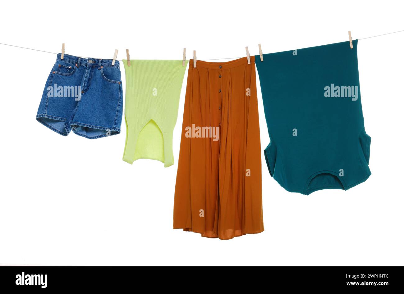 Different clothes drying on laundry line against white background Stock ...
