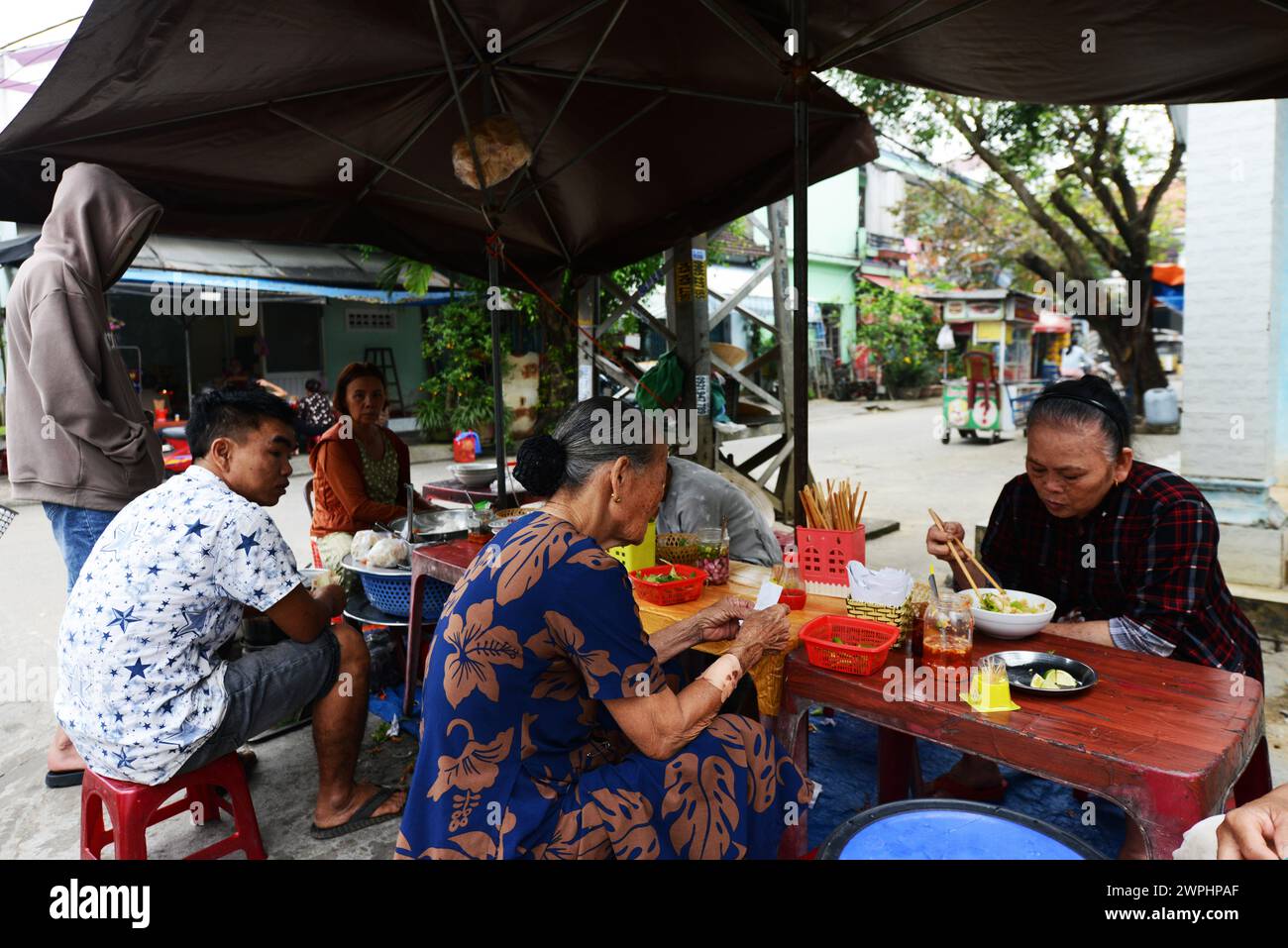 Man eating noodle soup in hi-res stock photography and images - Alamy
