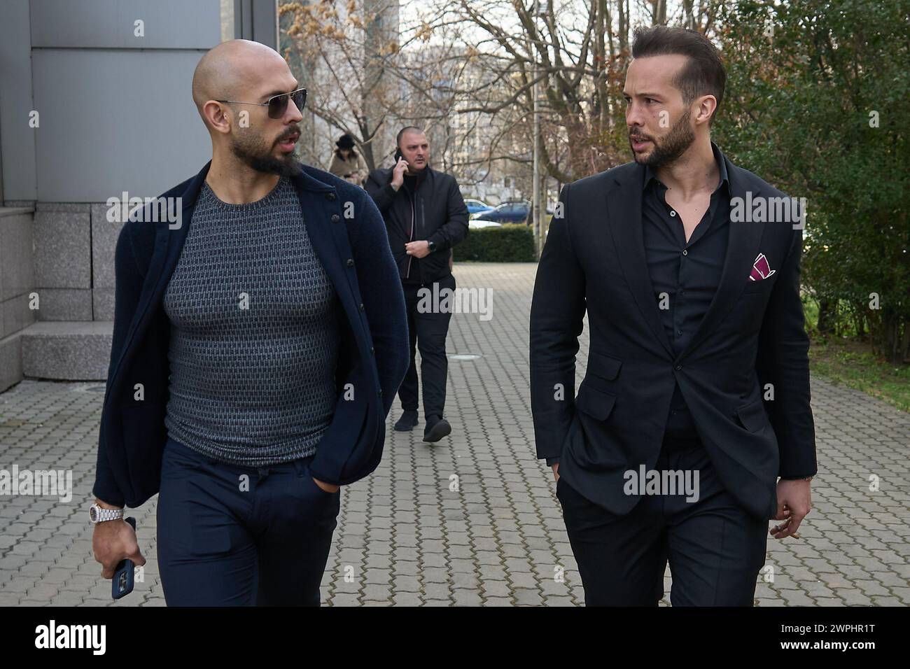 Bucharest, Romania. 7th Mar, 2024: Andrew Tate (L) and his brother Tristan Tate (R) leave the ...