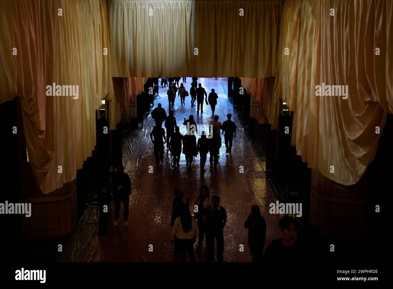 People walk along Oscars red carpet ahead of the 96th Academy Awards ...