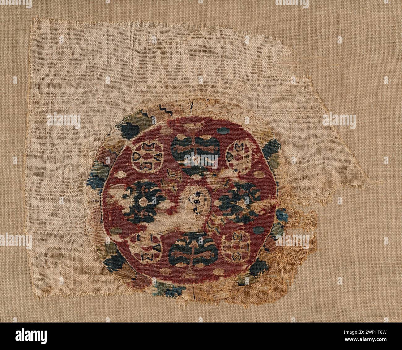 Coptic tunic fragment from the 8th century, featuring circular inserts ...