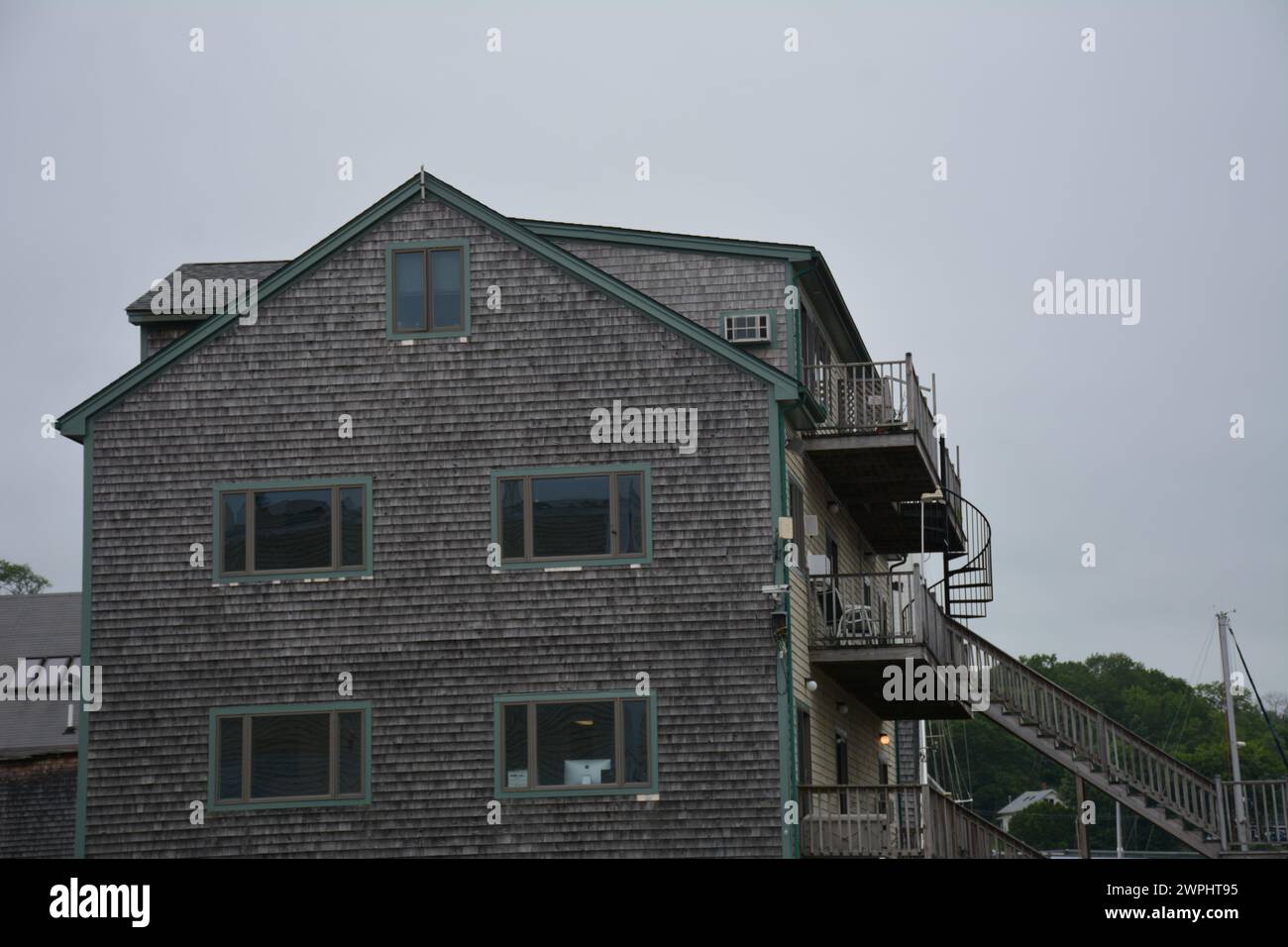 East Coast cedar shake house and its various parts forming design of ...