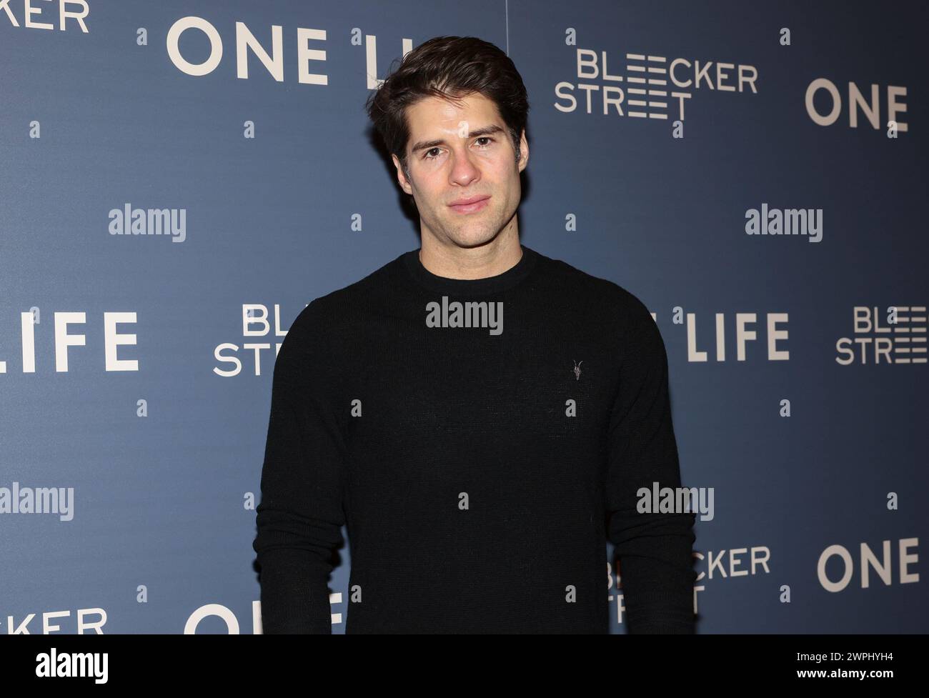 Asher Grodman attends the premiere of "One Life," at the Museum of ...