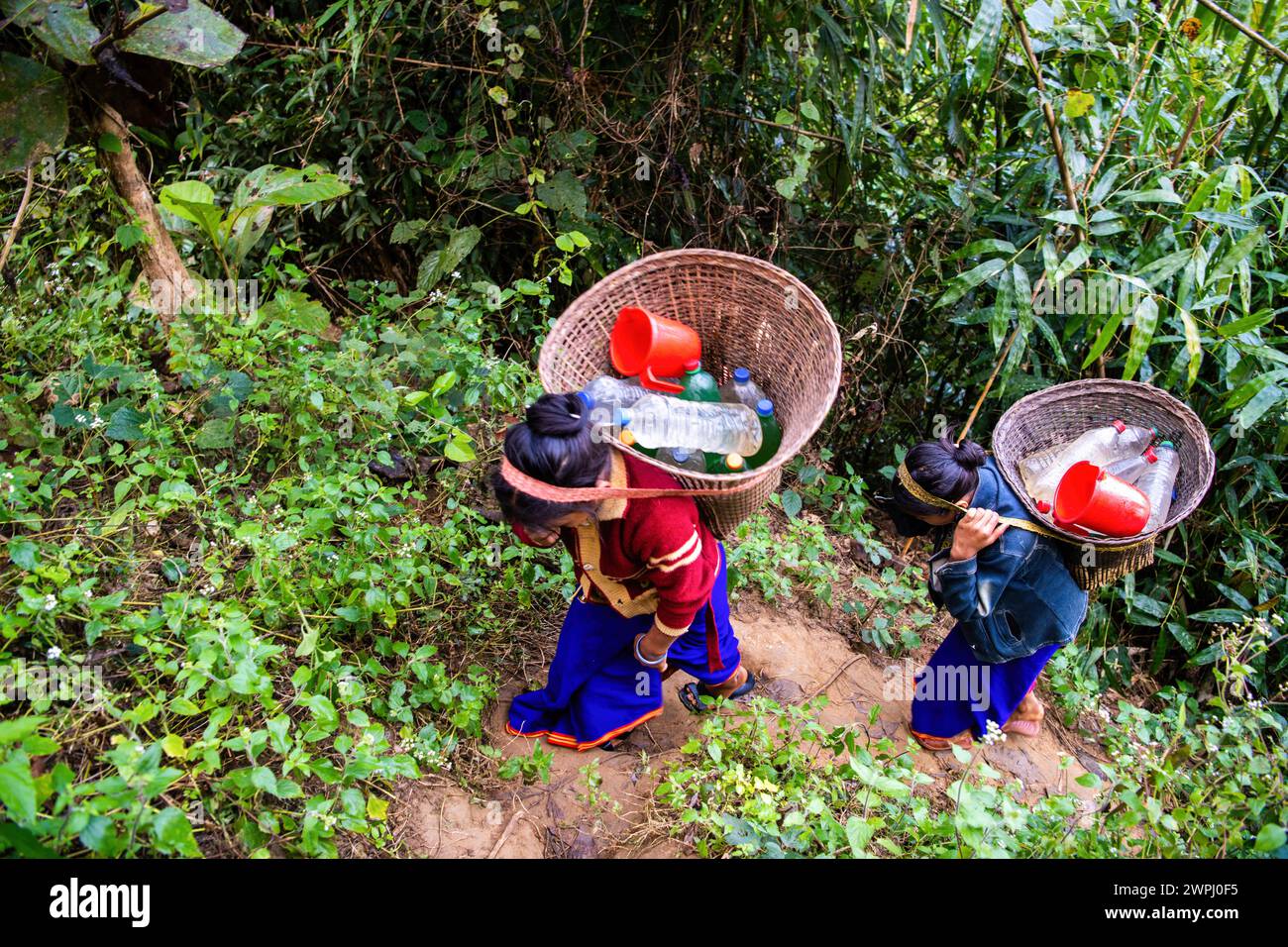 Bandarban, Bangladesh. 17th Jan, 2024. Mro children return home after ...
