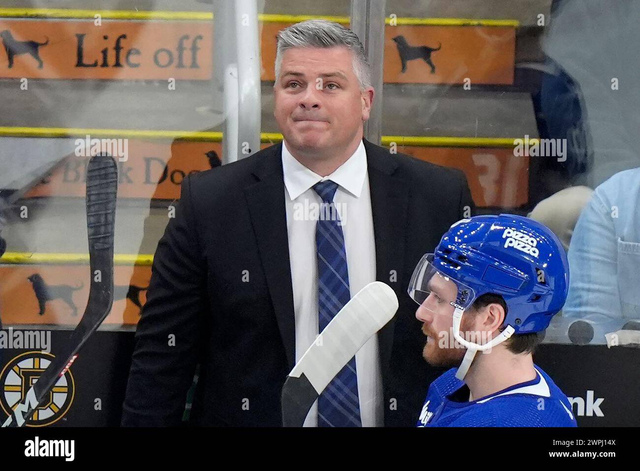 Toronto Maple Leafs head coach Sheldon Keefe, top, watches from the ...