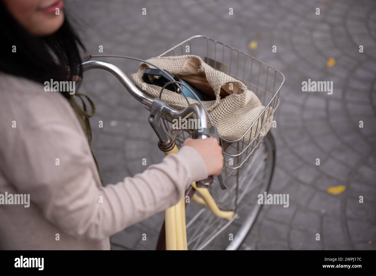 Woman pushing her bicycle hi-res stock photography and images - Alamy