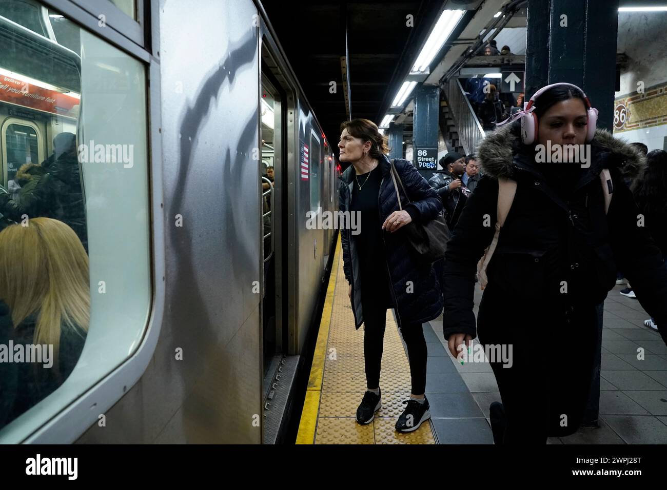 New York City, USA. 07th Mar, 2024. Commuters ride the subway at Penn ...