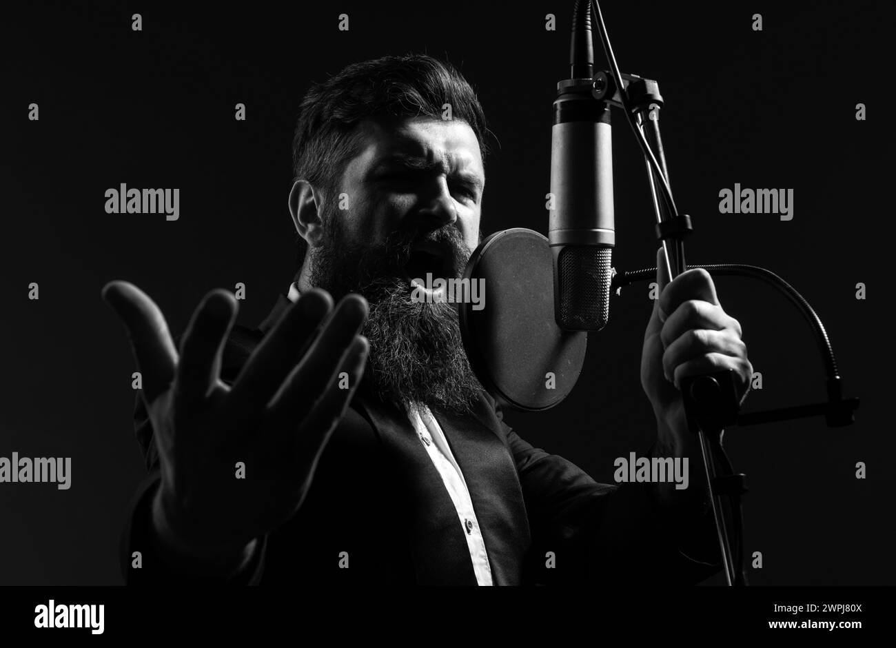 Man singing in recording studio Black and White Stock Photos & Images ...