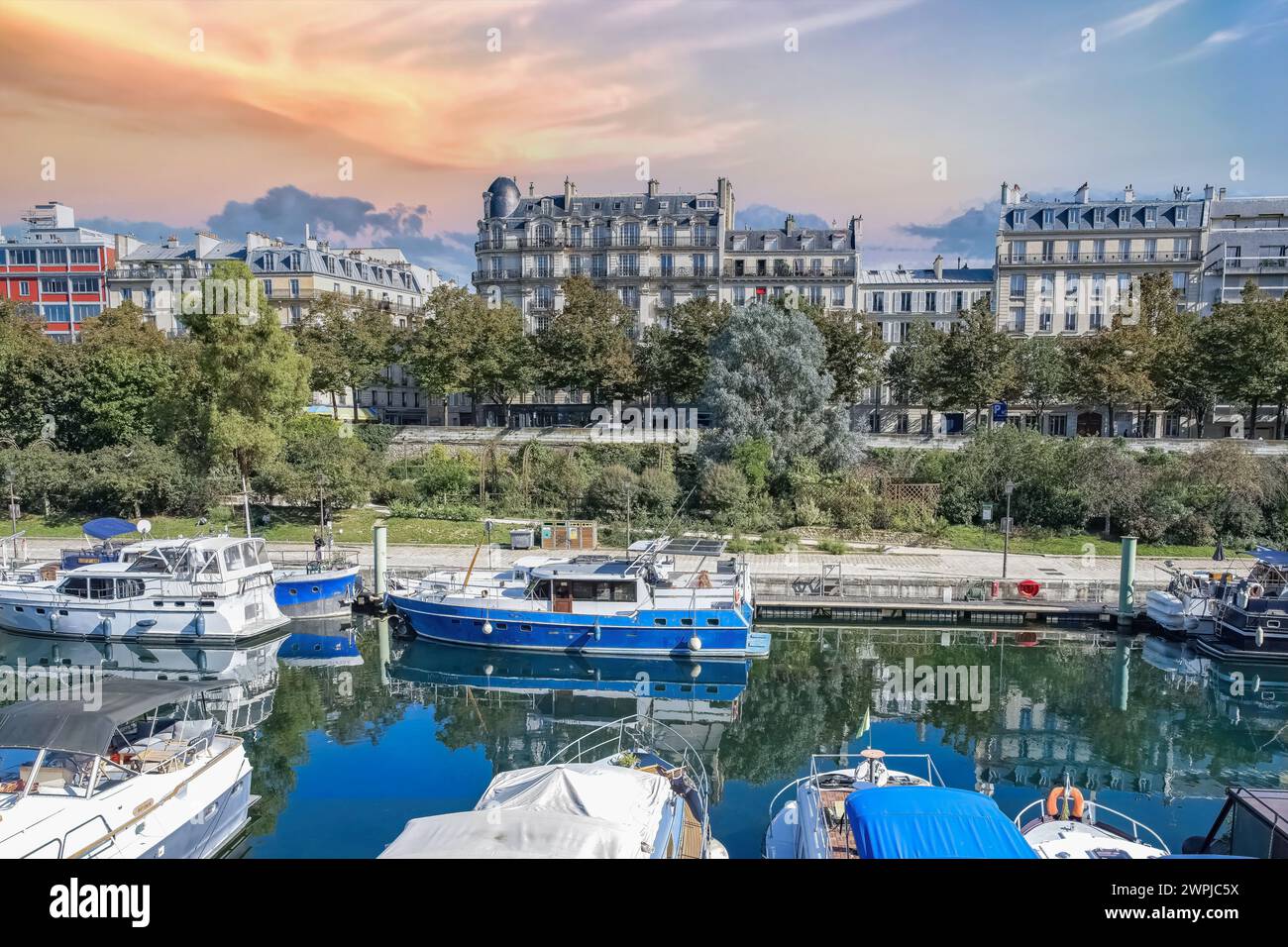 Paris, Bastille, the harbor with houseboats, and typical facade in ...