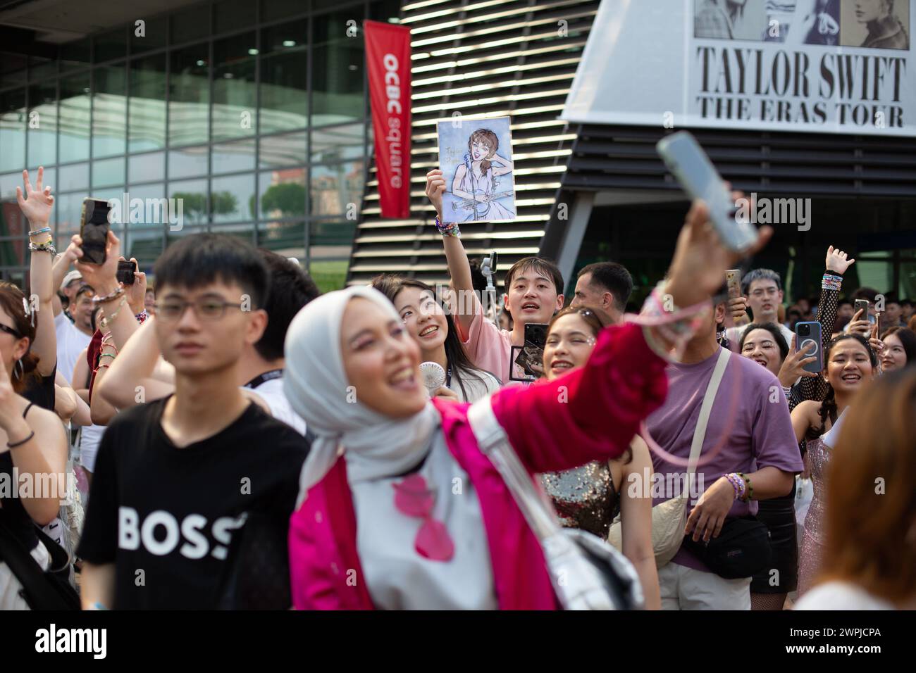 7 March 2024. A Chinese male fan holds a drawing portrait of Tay Tay ...