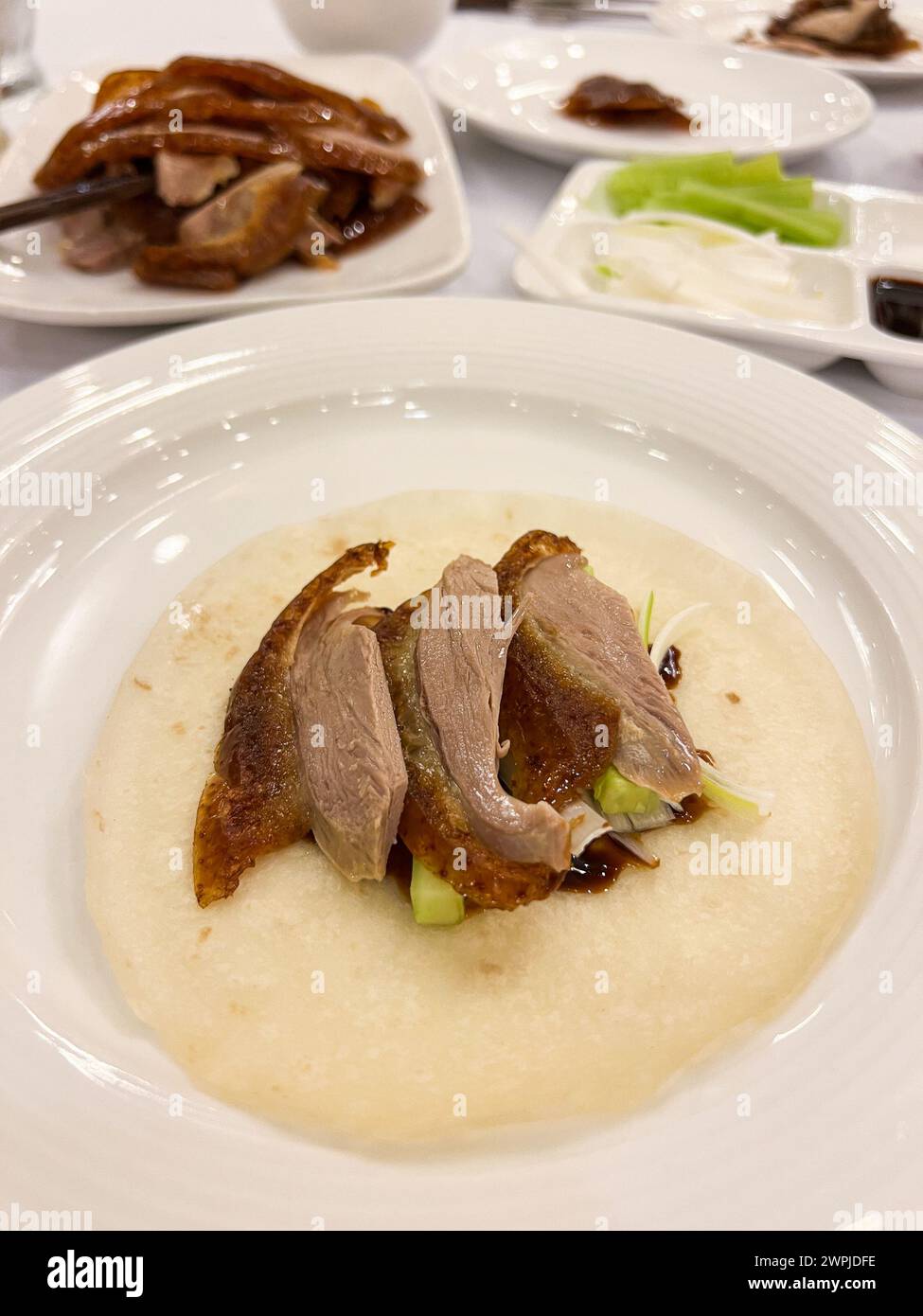Beijing, China. 09th Dec, 2023. A chef prepares roast duck at Quanjude ...