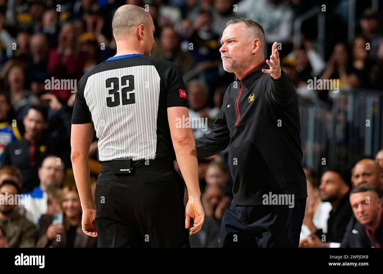 Denver Nuggets coach Michael Malone, right, argues for a call with ...