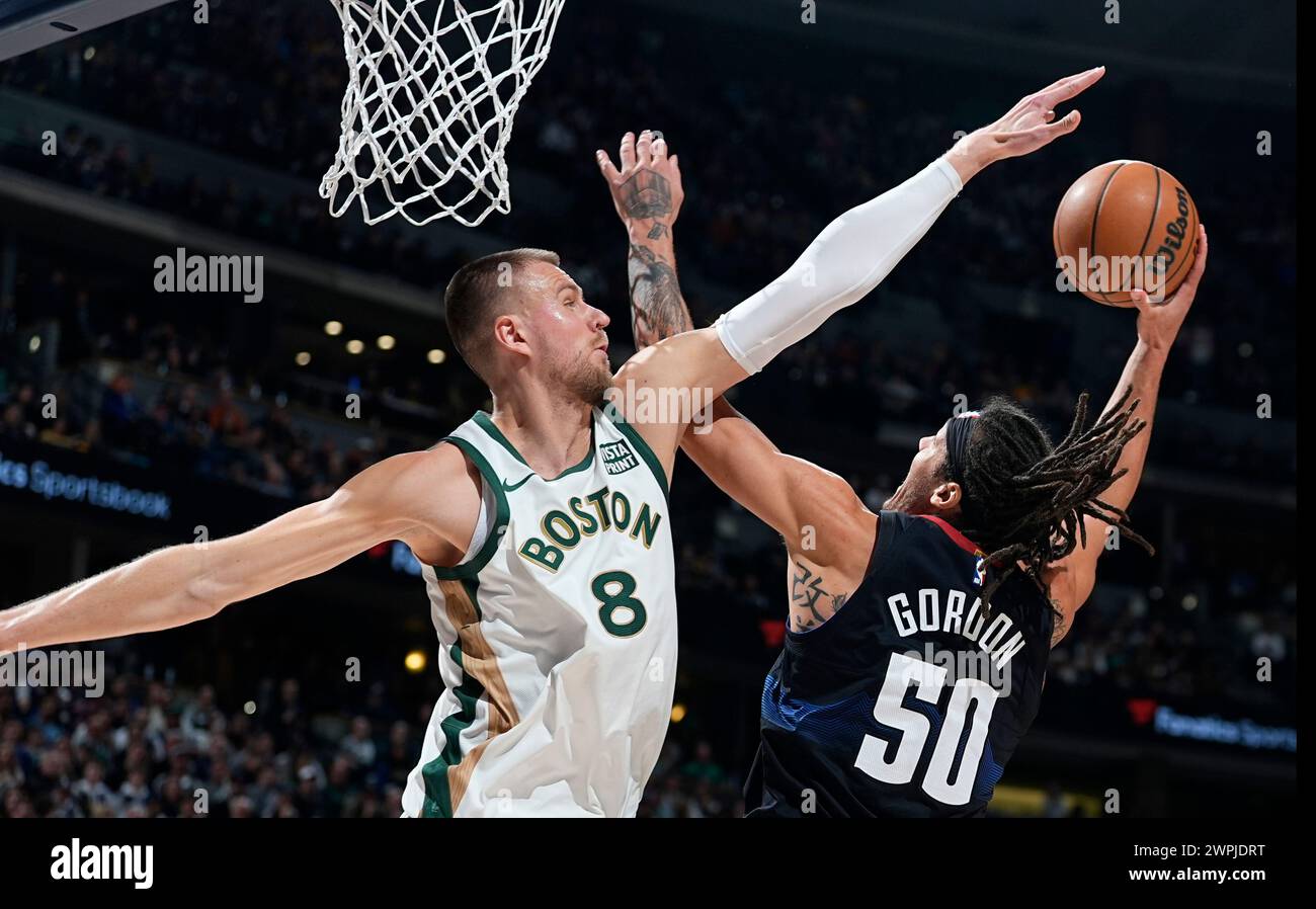 Denver Nuggets forward Aaron Gordon (50) shoots as Boston Celtics center Kristaps Porzingis ...