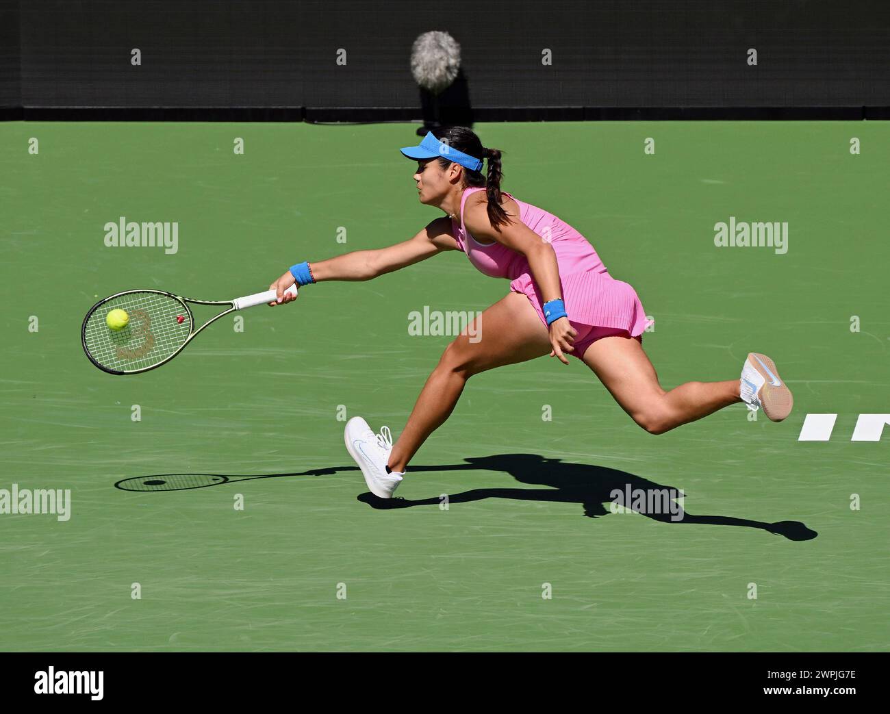 INDIAN WELLS, CA - MARCH 07: Emma Raducanu (GBR) chases after the ball ...