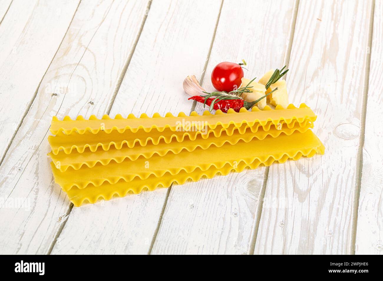Uncooked raw Lasagna dry sheets for bake Stock Photo - Alamy
