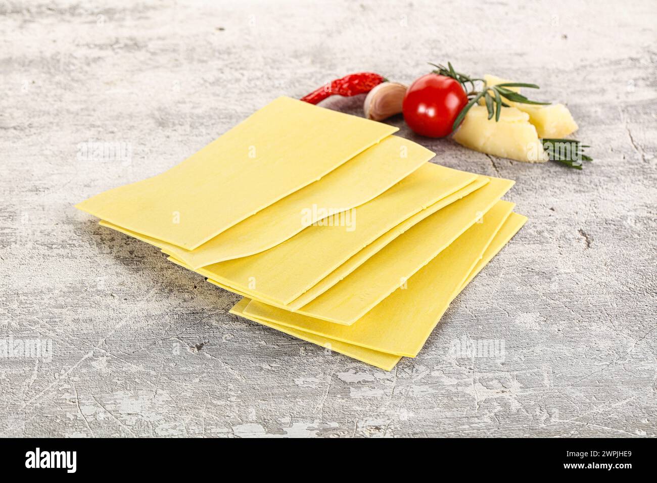 Uncooked raw Lasagna dry sheets for bake Stock Photo - Alamy