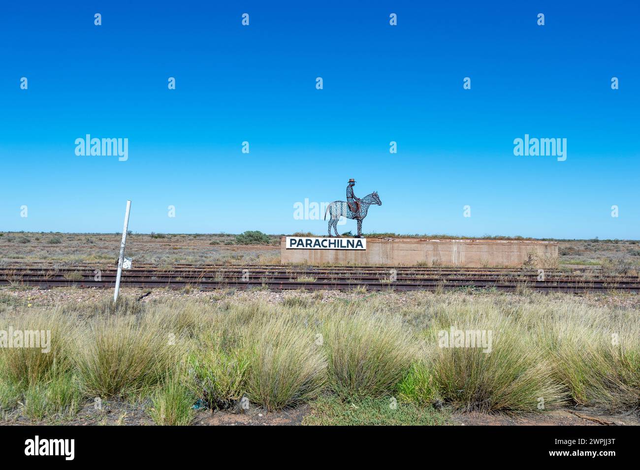 Metal sculpture of a man on a horse along the old Ghan Railway line ...