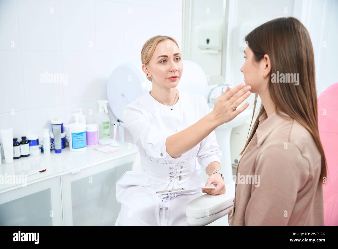 Examination with professional doctor before procedure in clinic Stock ...