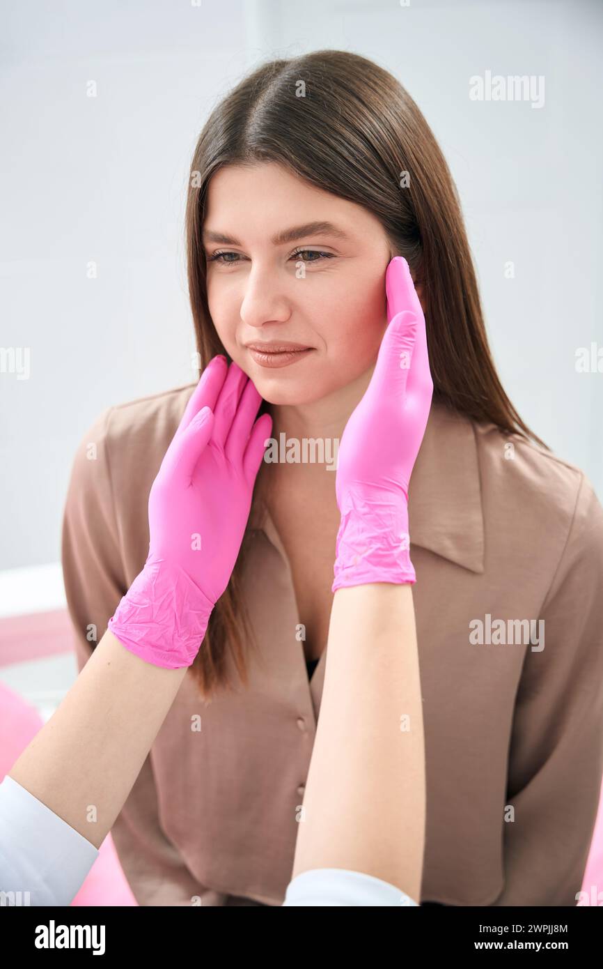 Examination with professional medical worker before procedure Stock ...