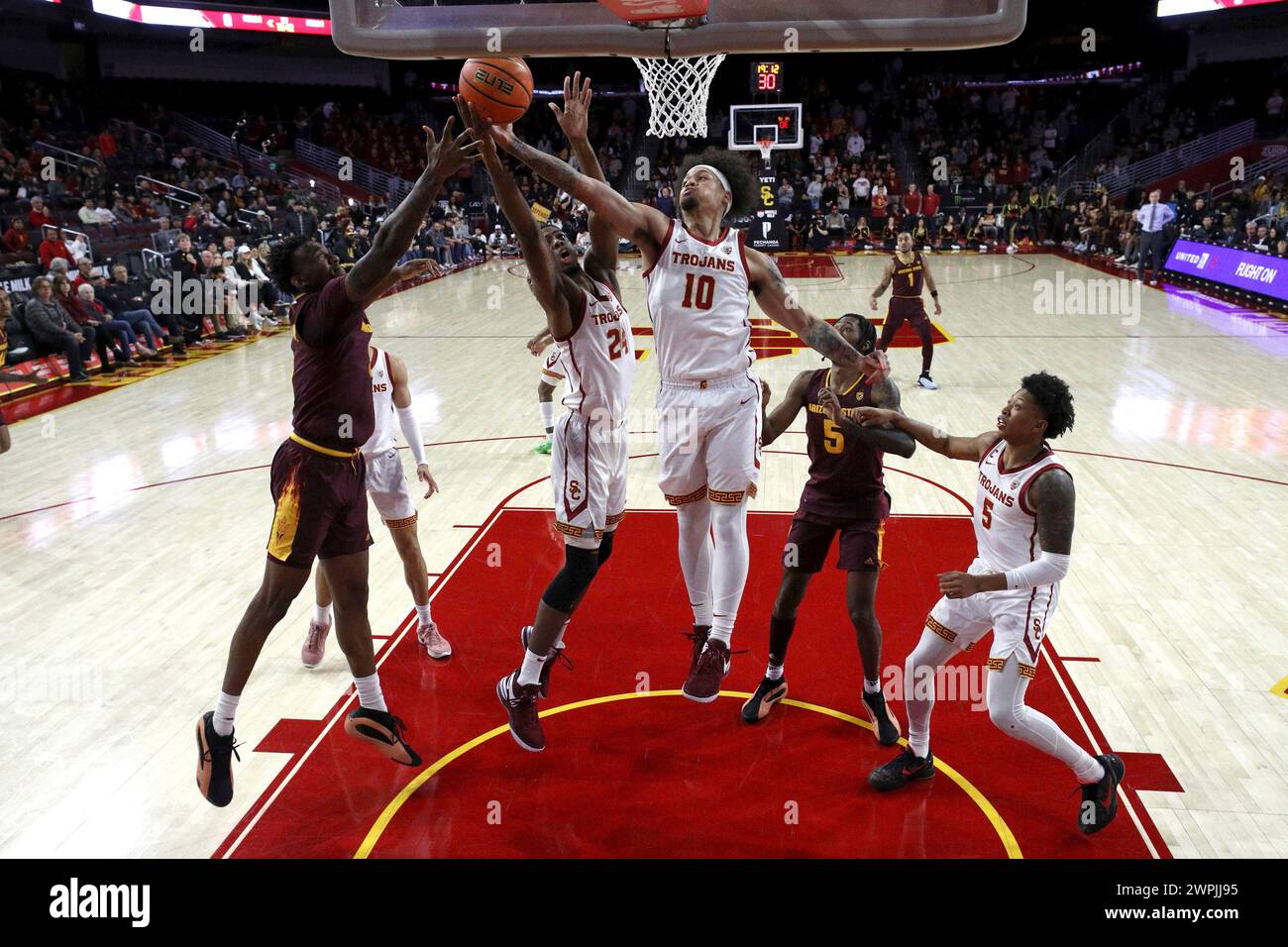 Southern California forward DJ Rodman (10) goes up for a rebound ...