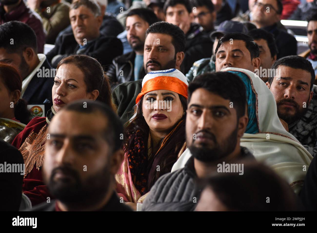 Non Exclusive: A man wears a tri-color turban during the working visit ...