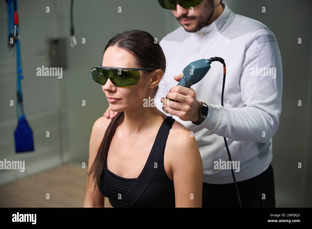 Method of treatment with ultrasound machine in clinic Stock Photo - Alamy