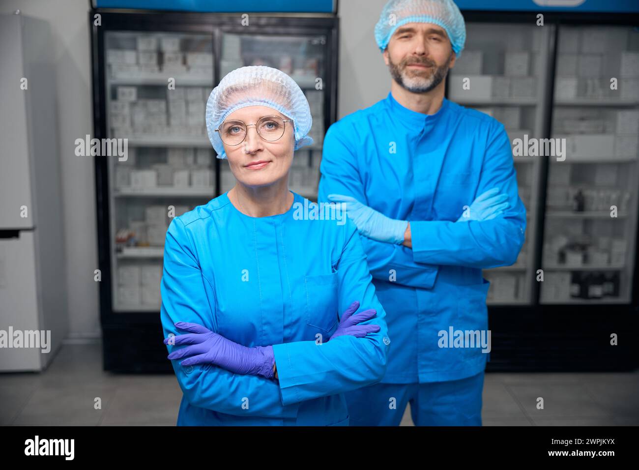 People in blue uniforms hi-res stock photography and images - Alamy
