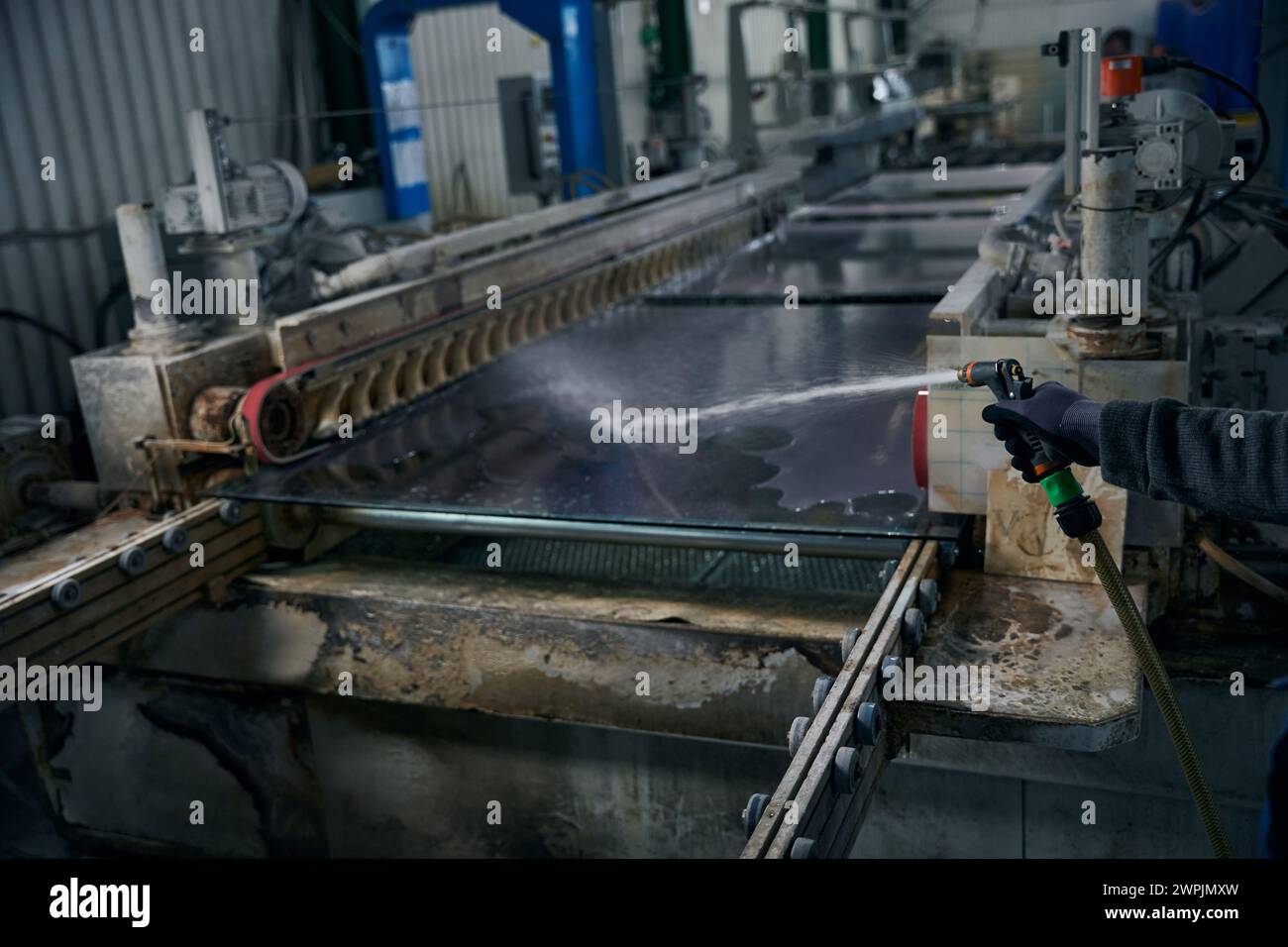Washing glass in window production Stock Photo - Alamy