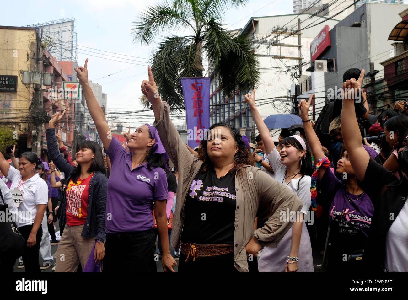 Womens groups scuffle with police while protesting on International ...