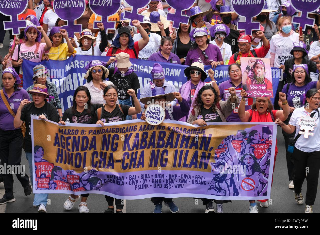 Womens groups scuffle with police while protesting on International ...