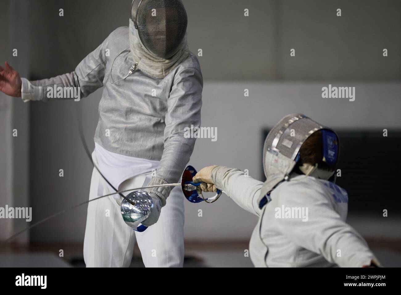 Fencers Nikita Kuznietsov (left) and Dmytro Shostak compete in the "All ...