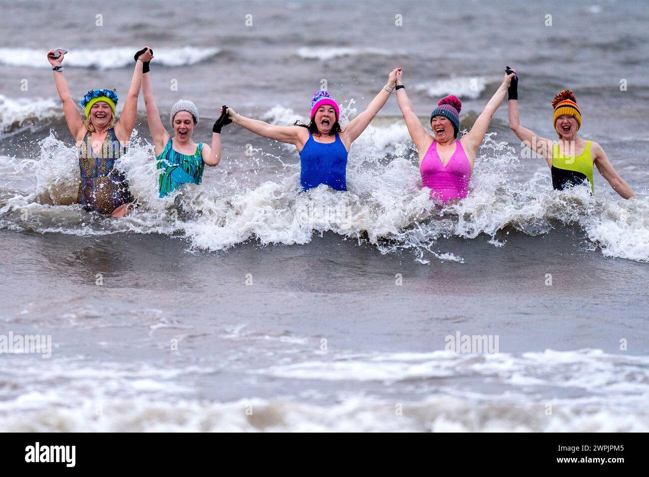 Swimmers take a dip in the Firth of Forth at Portobello in Edinburgh ...