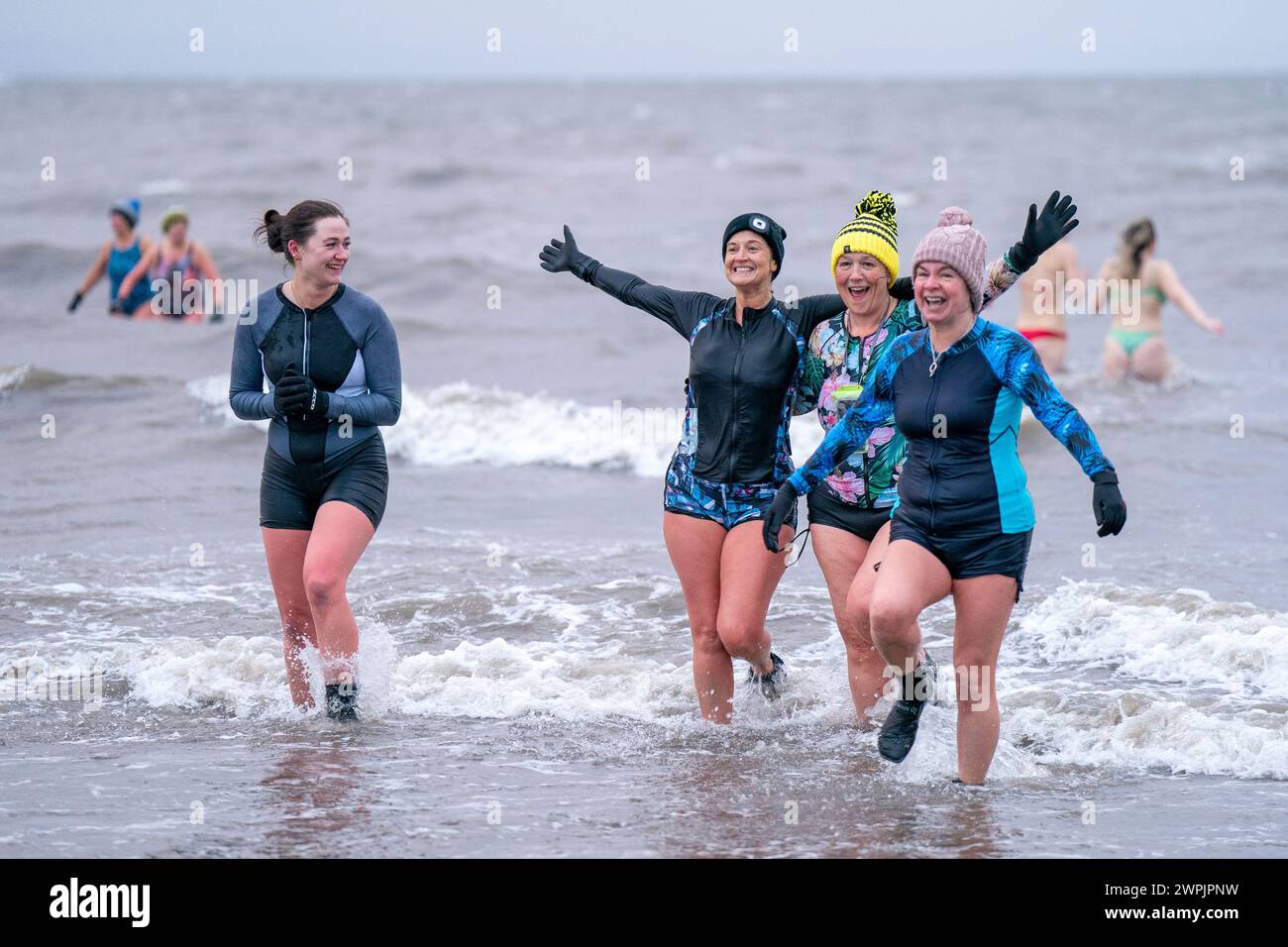 Swimmers take a dip in the Firth of Forth at Portobello in Edinburgh ...