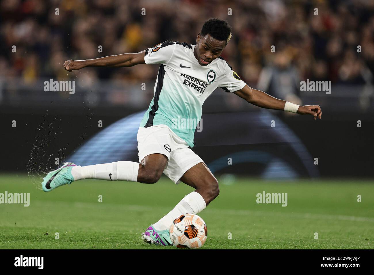 Brighton and Hove Albion's Ivorian forward Simon Adingra controls the ...