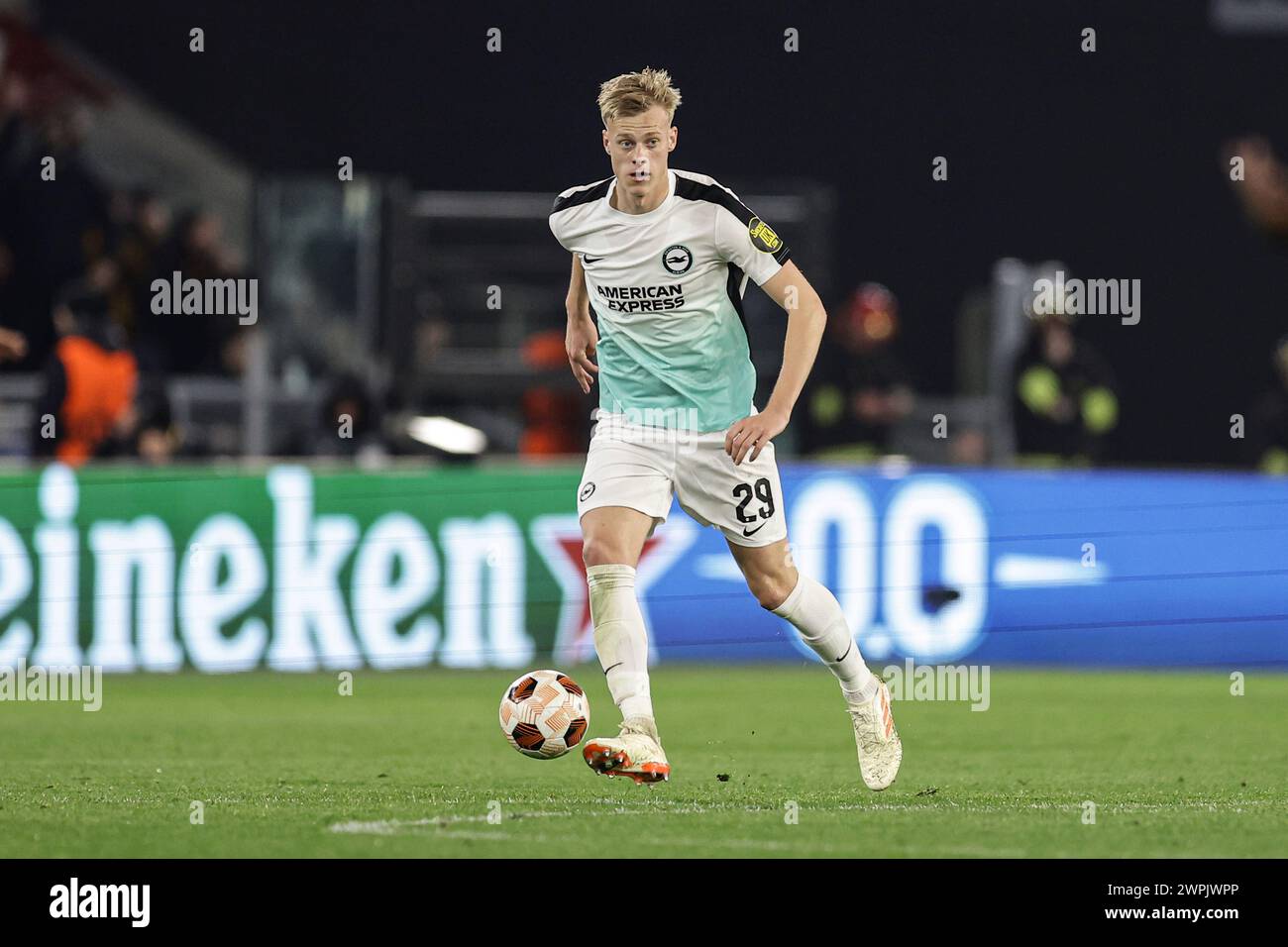 Brighton and Hove Albion's Dutch defender Jan Paul van Hecke controls ...