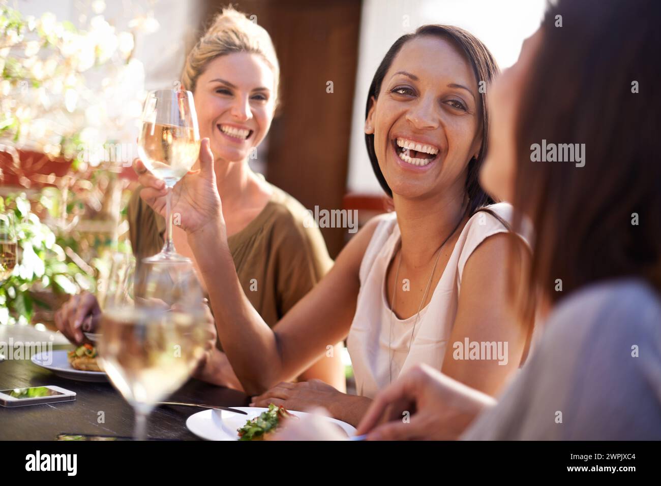 Women, wine and dinner at restaurant with laughing, bonding and relax ...