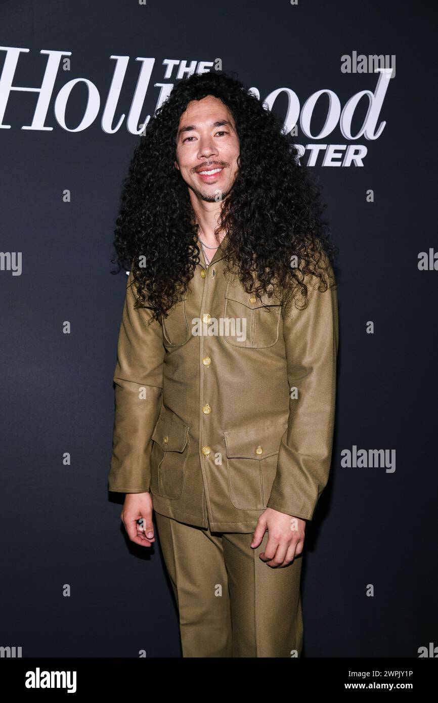 Cole Walliser walking on the red carpet at the The Hollywood Reporter ...