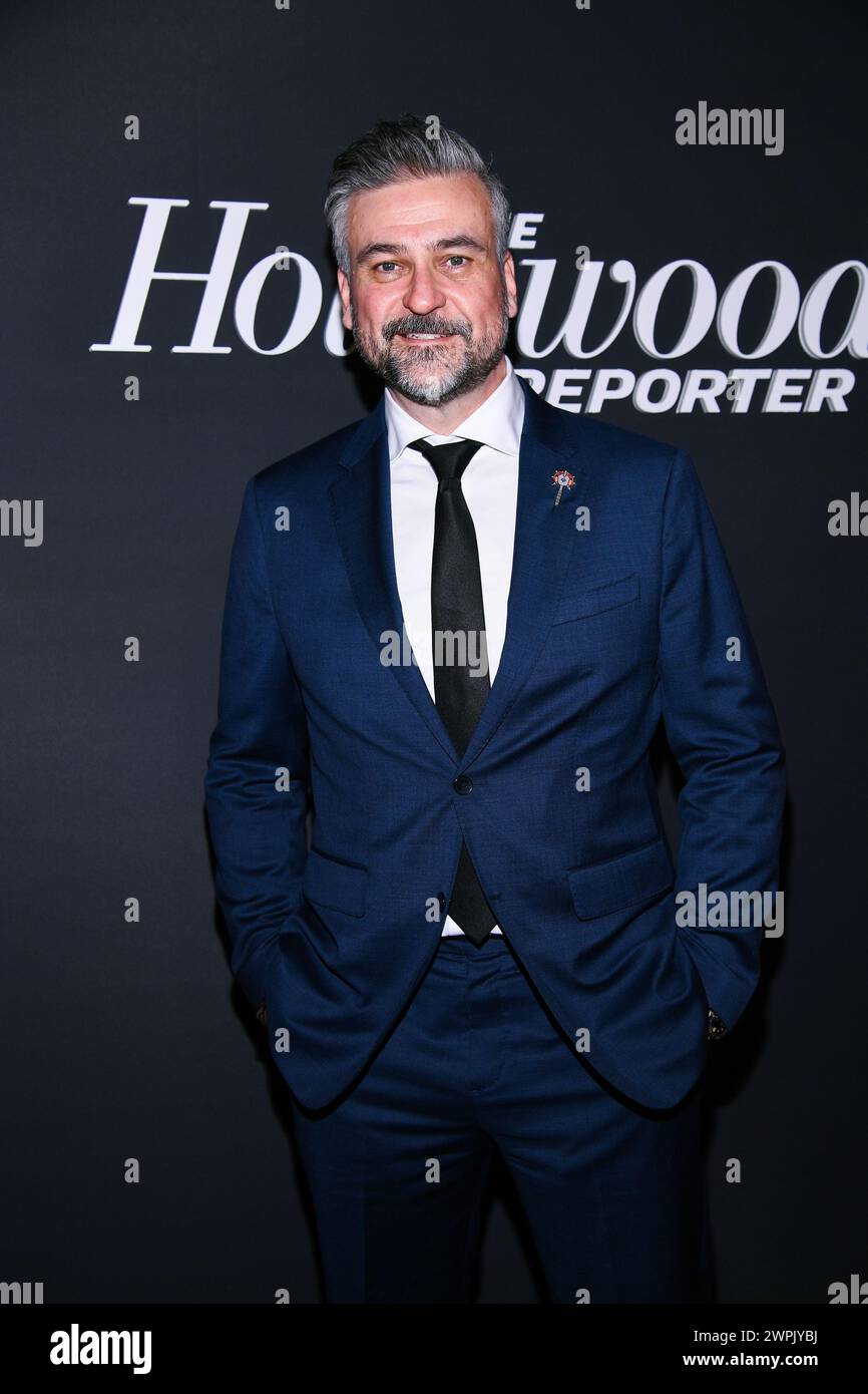 Troy Quane walking on the red carpet at the The Hollywood Reporter ...