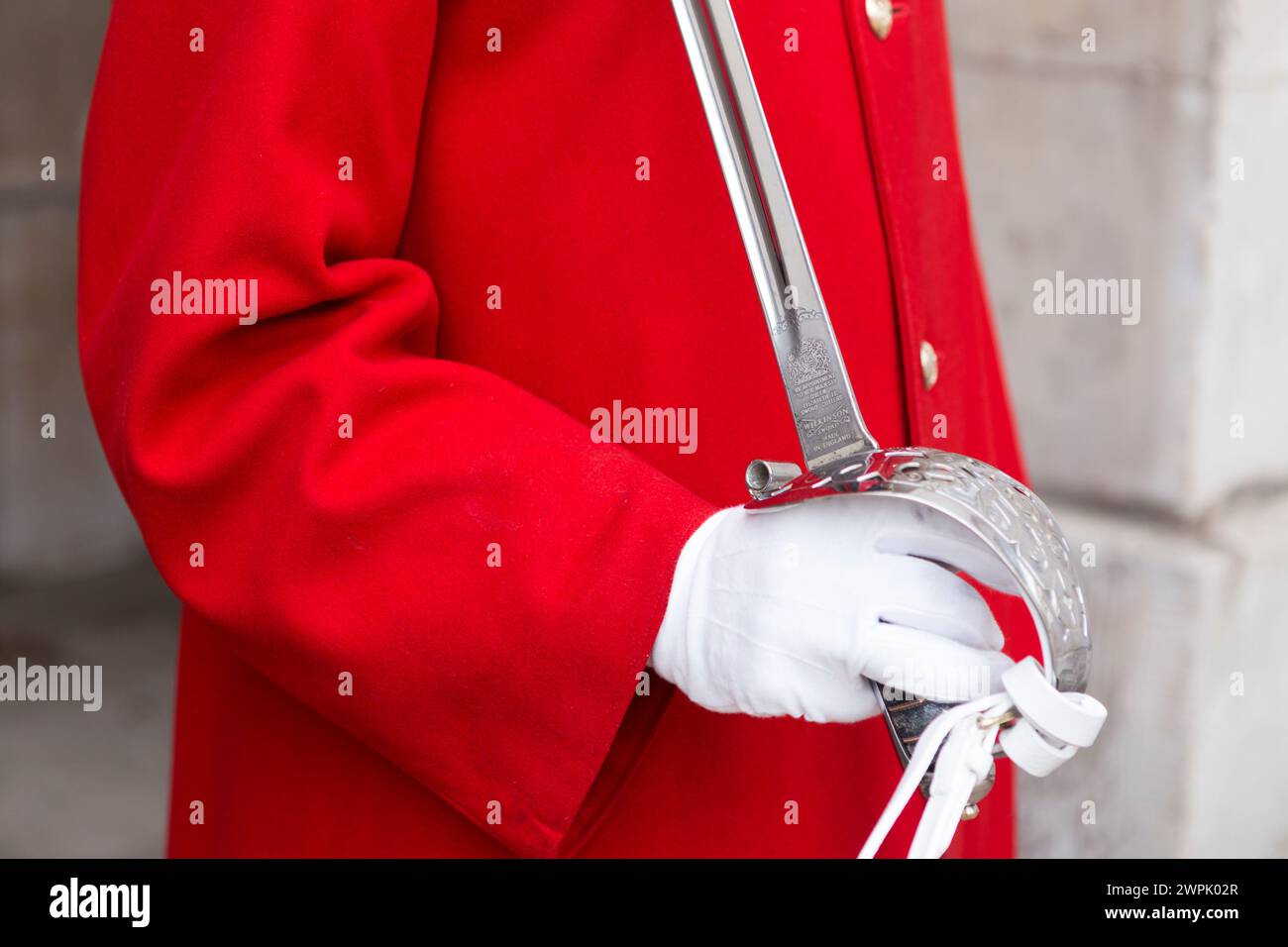 UK, London, detail of sword and hand of a Royal Guard of the household ...