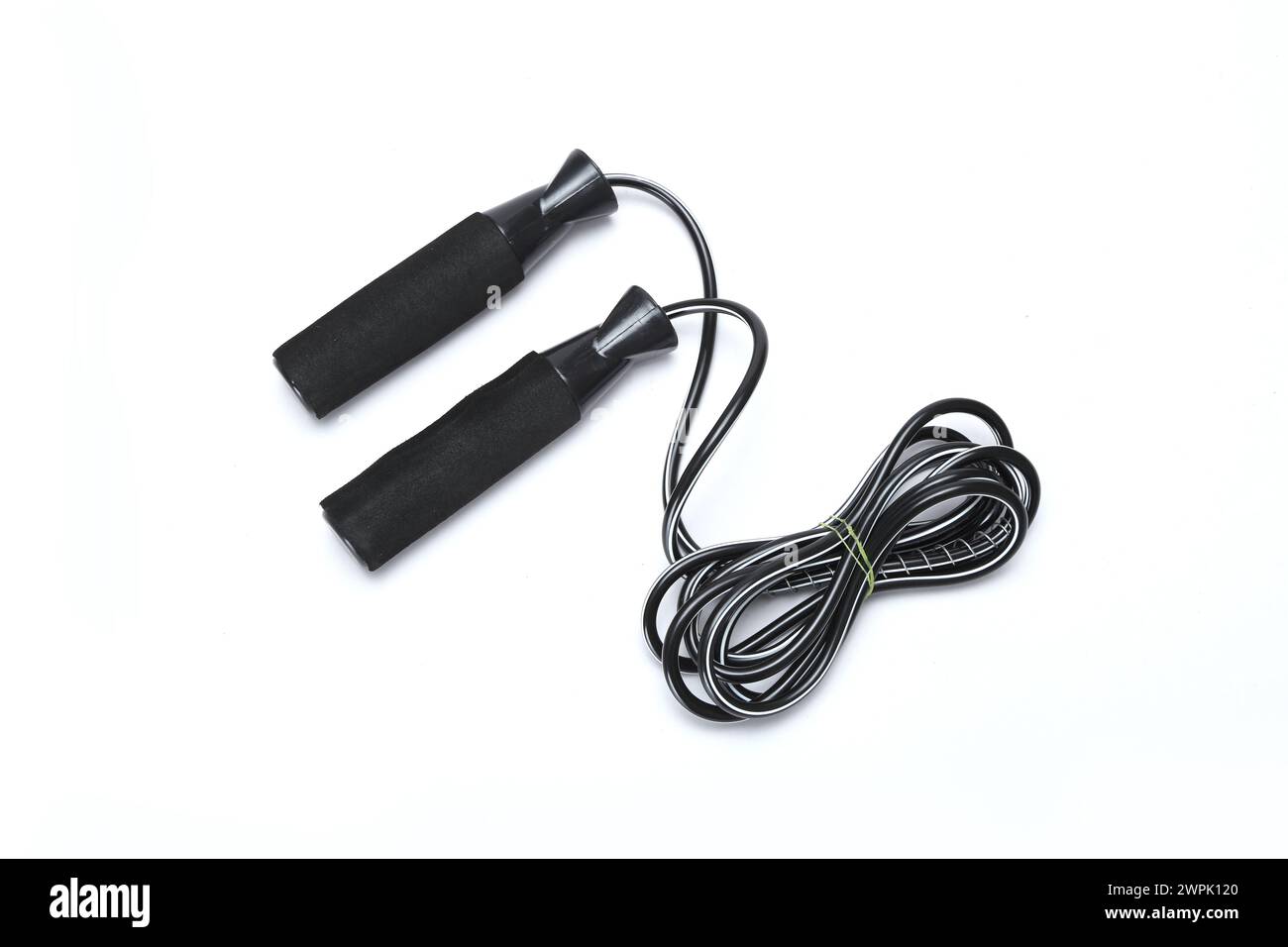 black skipping rope isolated on white background Stock Photo - Alamy