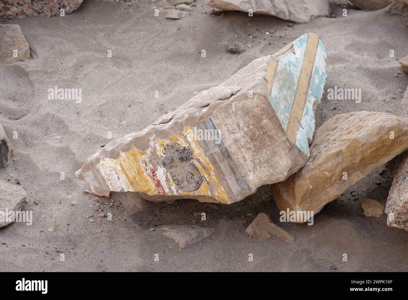 broken painted block at the ruins of Ancient Yebu, Elephantine Island ...