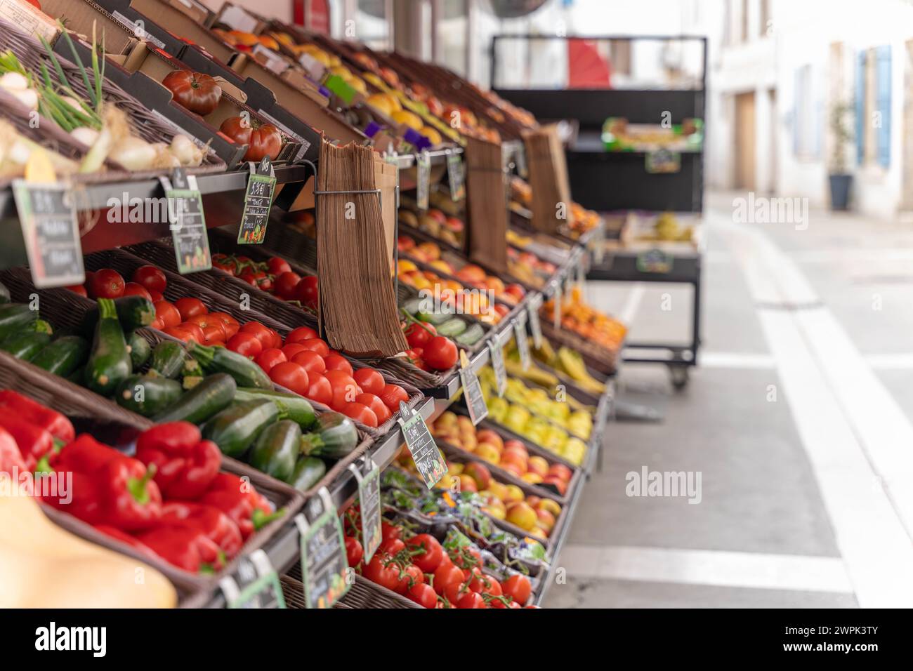 The fresh produce displayed on a market vendor's stall for sale Stock ...