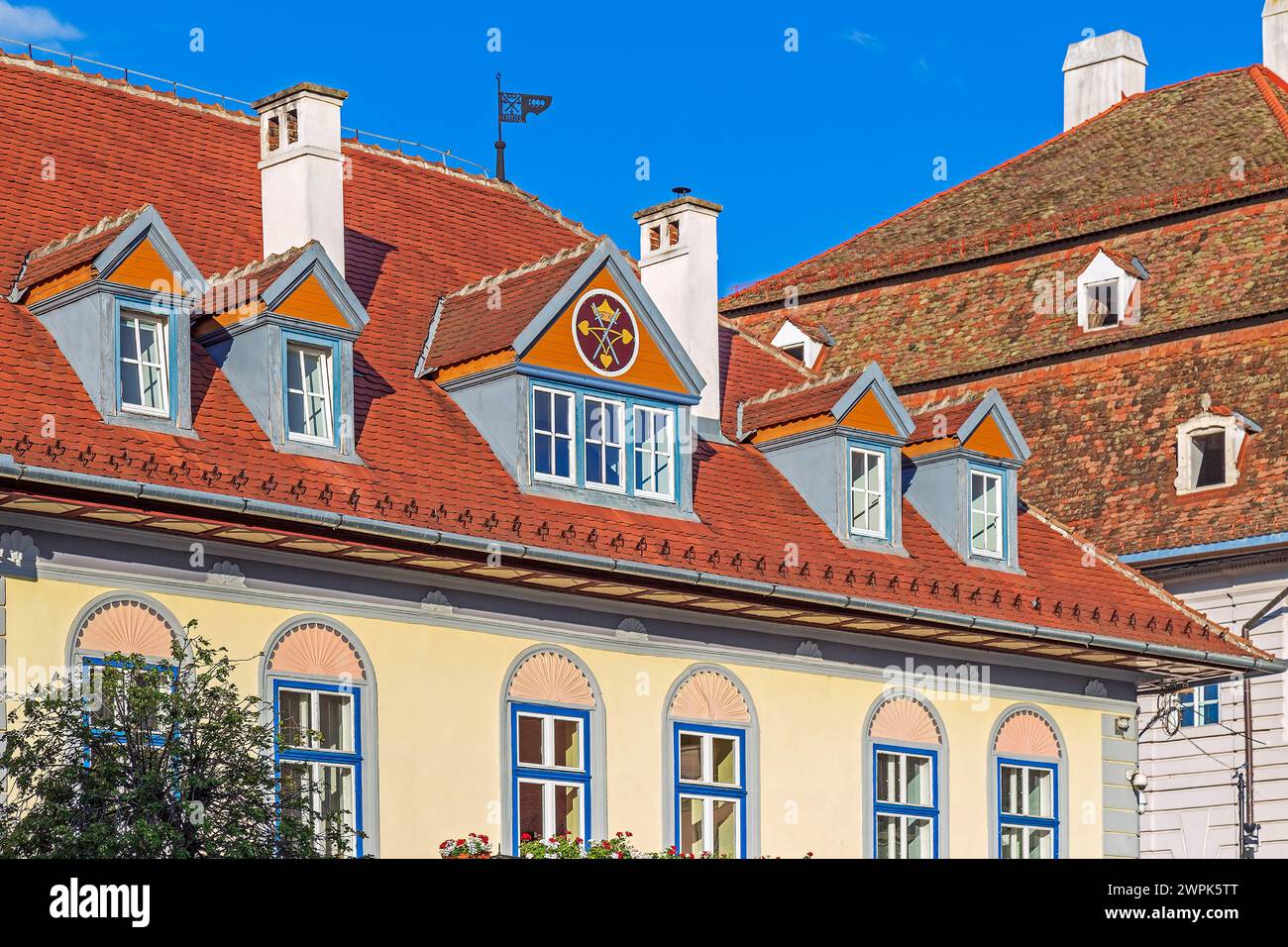 Roofs with windows and facade for houses, typical architecture of the ...