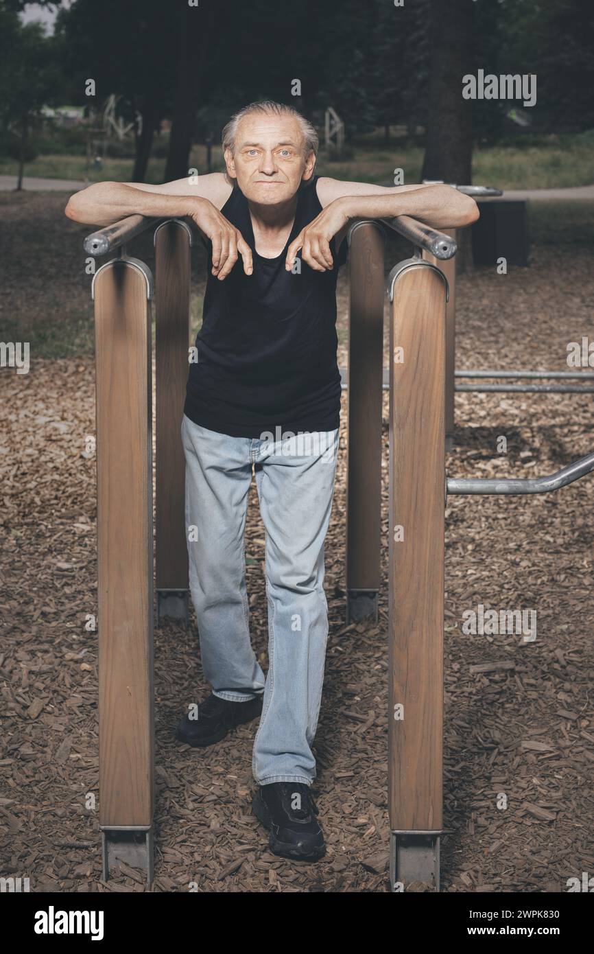 Ugly man of bad condition trying workout in outdoor gym Stock Photo - Alamy